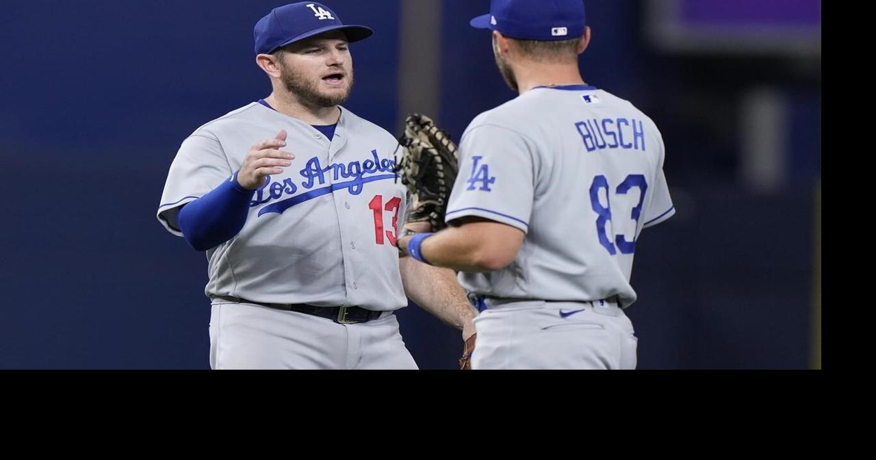 Dodgers credited with a run when Marlins ball boy picks up a ball that ...