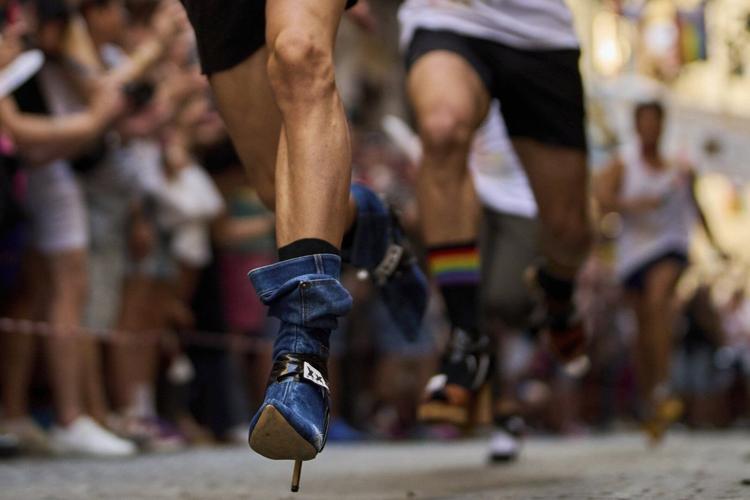 Photos of Madrid's high heel race where runners braved the heat for ...