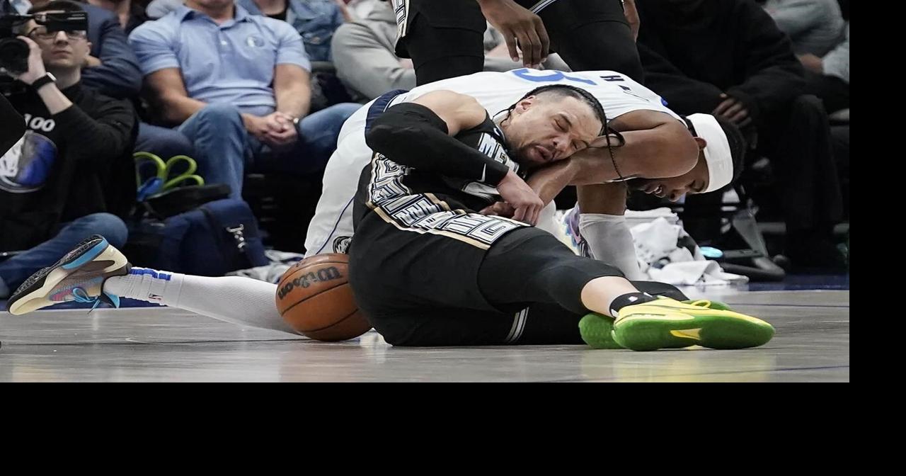 NBA fines Grizzlies’ Brooks $35K for shoving camera person