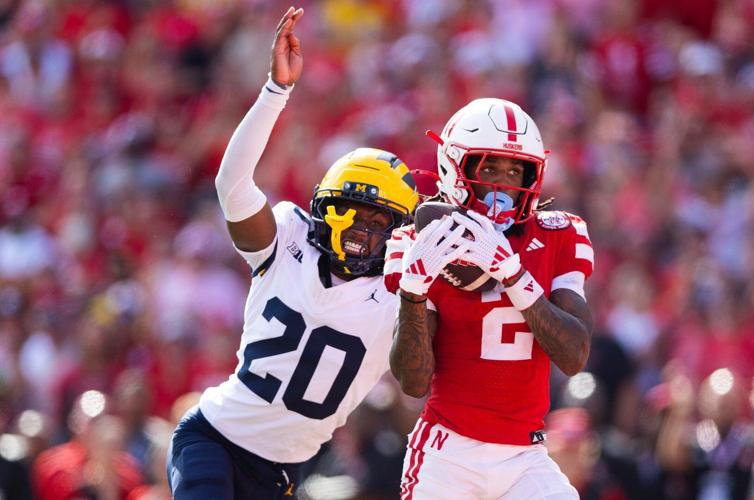 No. 21 Michigan uses 3 long TD runs to beat Nebraska 30-27, extend Huskers' skid against Top 25 foes