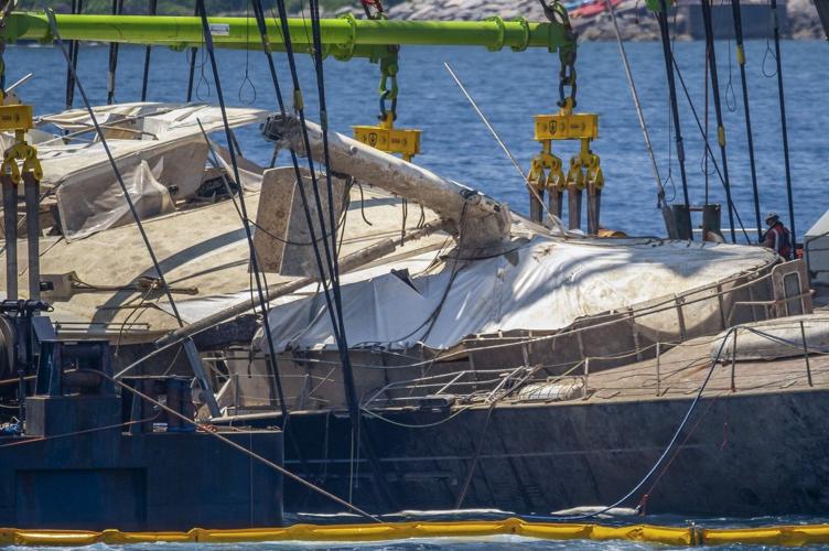 Sunken Bayesian superyacht lifted out of the water off Sicily as ...
