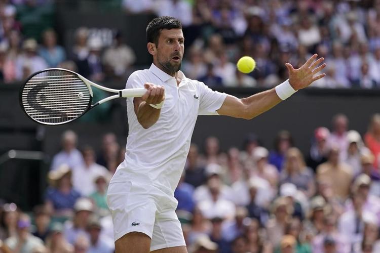 Novak Djokovic plays at Wimbledon with the number ‘23’ printed on his ...