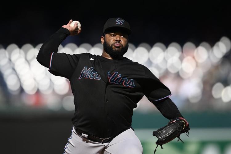 Cueto wins in his return as Burger hits 2 of the Marlins' 4 home runs ...