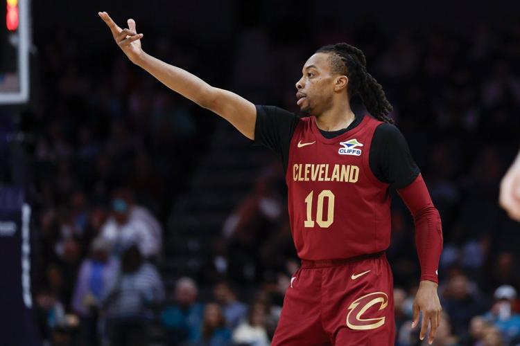 NBA-leading Cavaliers win 13th straight game, rallying to edge Hornets 118-117