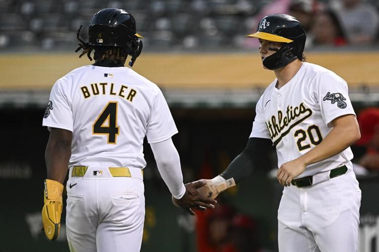Butler, Rooker go deep and Athletics top Angels 7-5