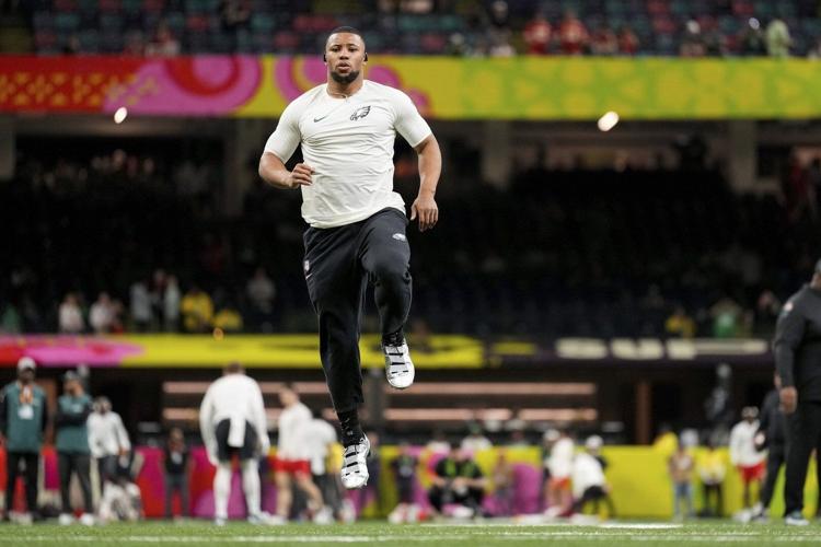 Eagles running back Saquon Barkley sets the NFL's season rushing record ...