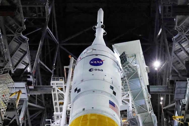 NASA hauls its repaired moon rocket from the hangar back to the pad for ...