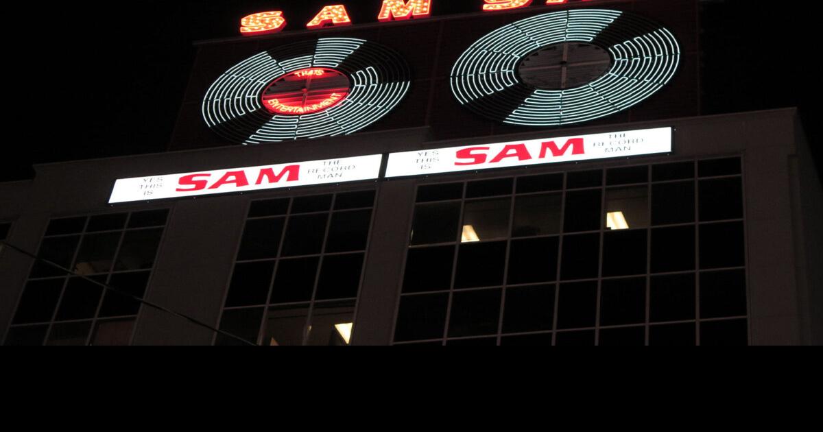 Sam the Record Man sign lights up Yonge Dundas Square