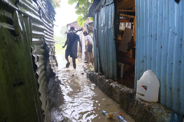 Dominican officials inspect damage inflicted by Tropical Storm Franklin ...