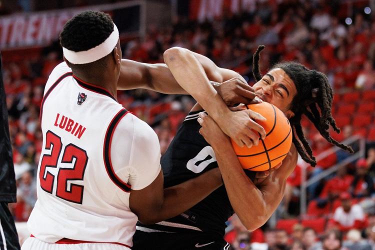 Williams and Holloman lead No. 25 NC State past VCU 85-79 in return to ...