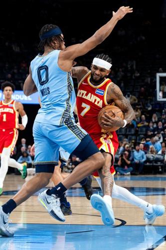 Jalen Johnson has 32 points, 15 rebounds to lead the Hawks to a 124-122 ...