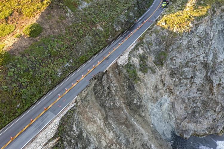 Motorists creep along one lane after part of California's iconic ...