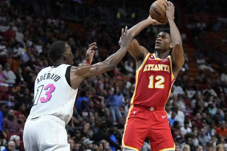 Butler scores 26, Heat bench adds 59 in 130-128 win vs Hawks