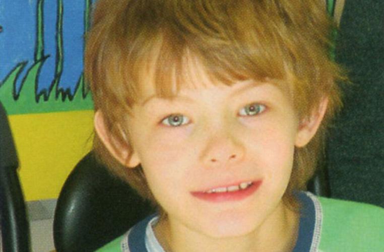Sombre crowd of hundreds gathers to mourn 11-year-old boy