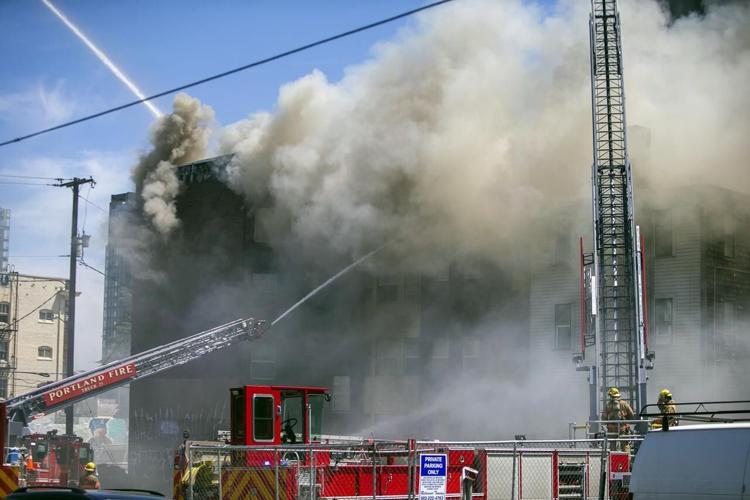 More than a dozen people rescued from apartment fire in downtown ...
