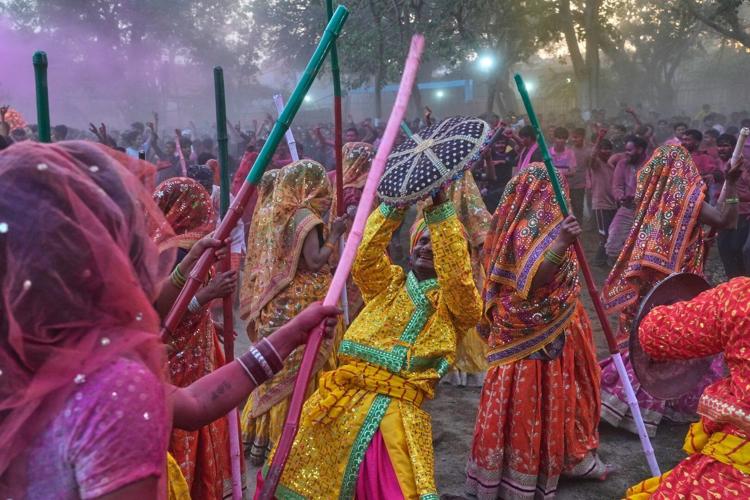 Photos of revelers celebrating Holi, the Hindu festival of colors, in ...