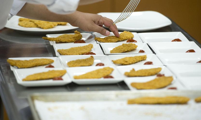 Teen testers give a thumbs-up to new menu meant to save school cafeterias