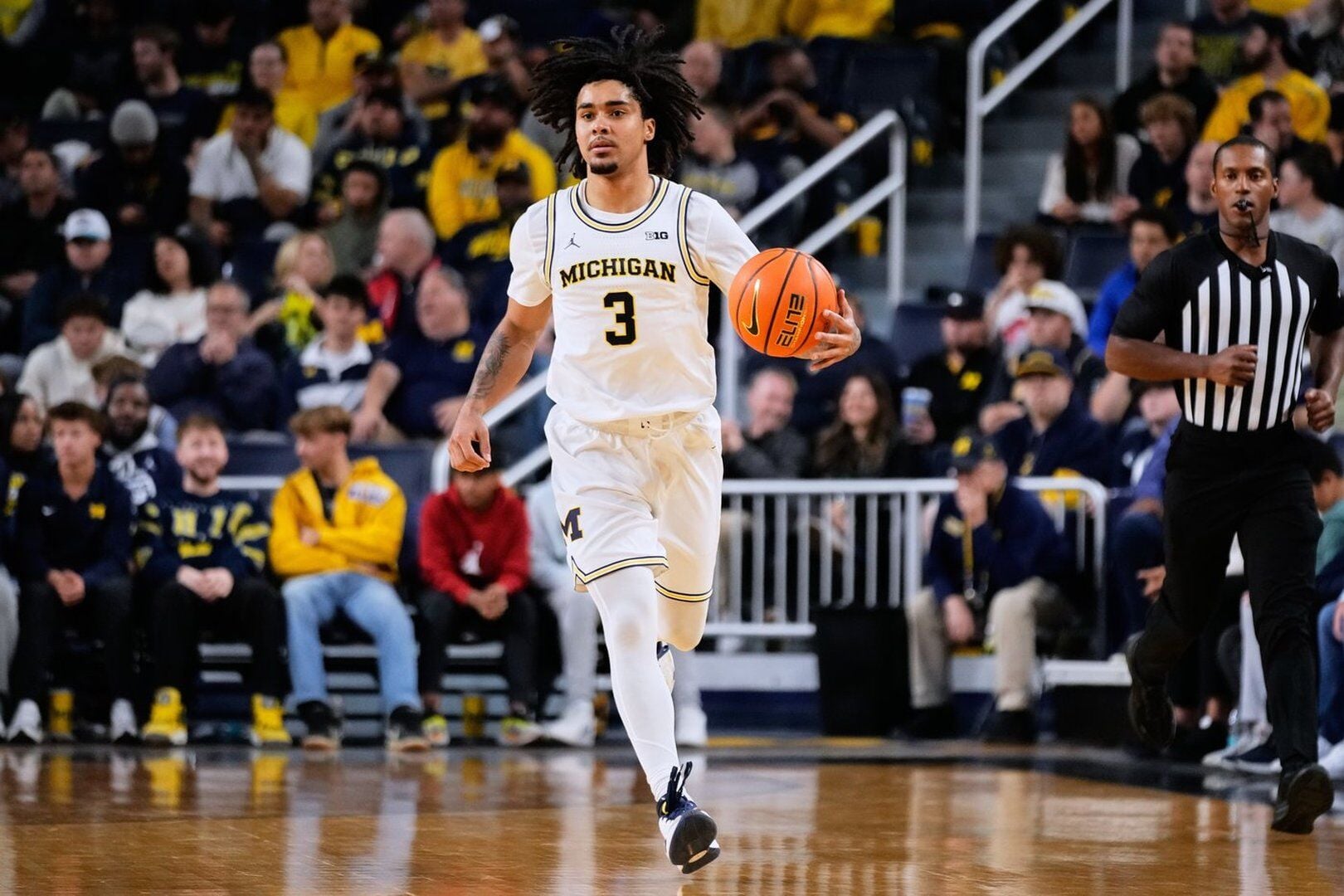 No. 6 Michigan holds off Wake Forest 85-84 in overtime, led by Elliot ...