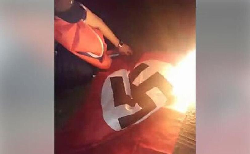How a Nazi flag became a burning symbol of the racial divide in a tiny ...