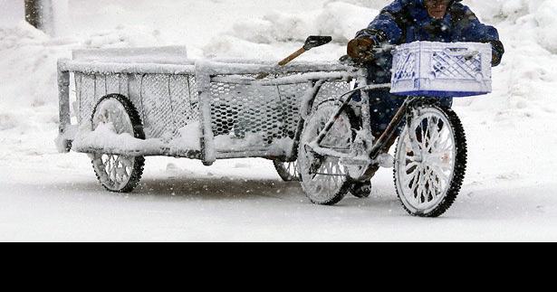 Snow, slush wipe out electricity for 50,000