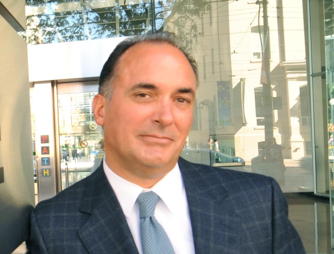 OLG bets on former banker to lead it back to prosperity