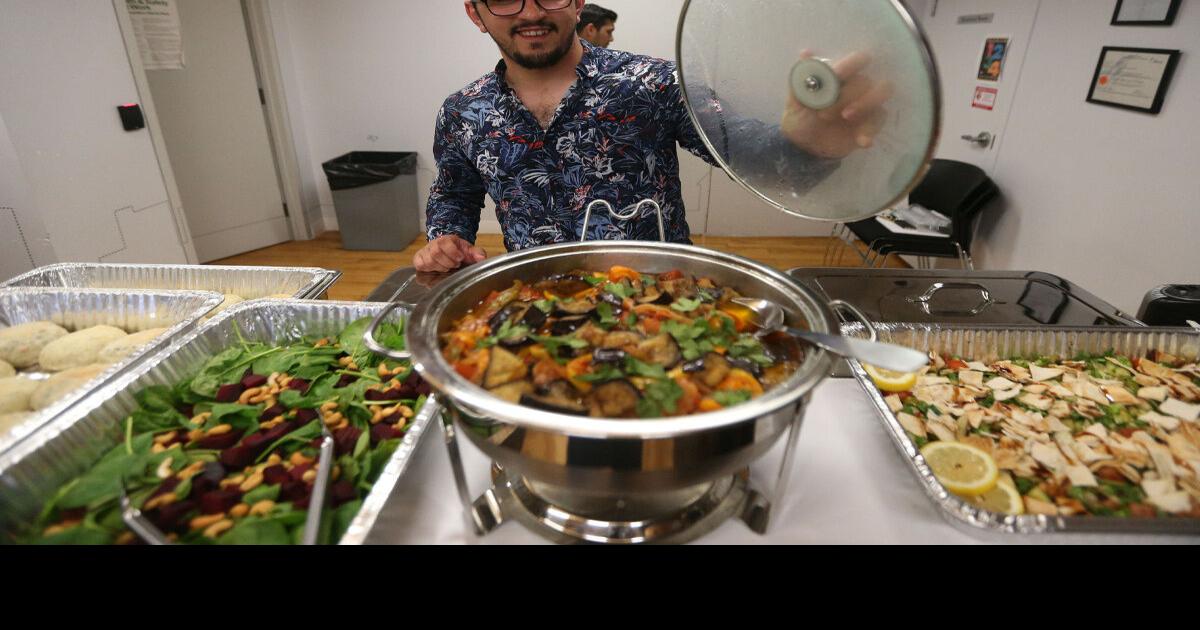 Newcomers get warm reception at Refugees Welcome dinner