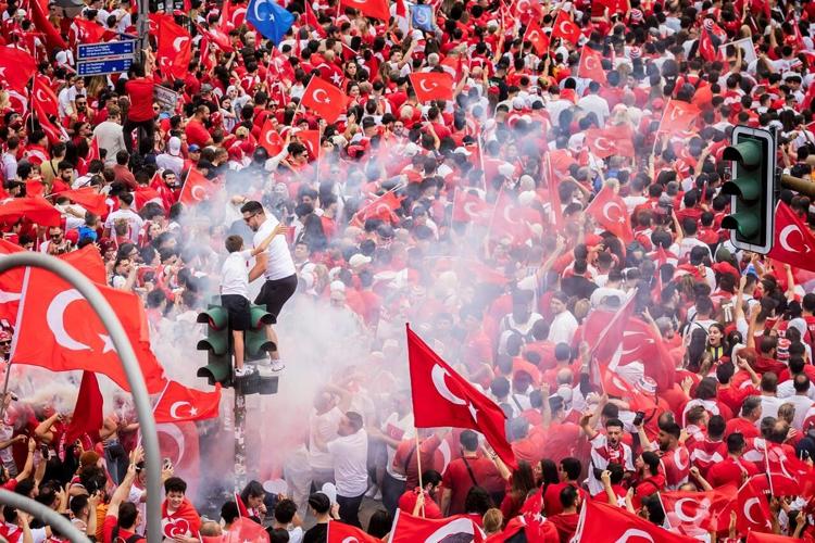 Turkey supporters make controversial hand gesture on way to stadium and ...