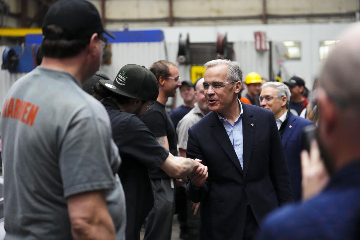 Mark Carney sticks to his banker suits, even in the election