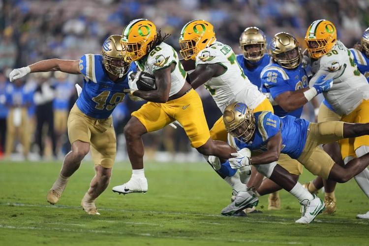 Dillon Gabriel throws for 3 TDs as No. 8 Oregon beats UCLA 34-13 in ...