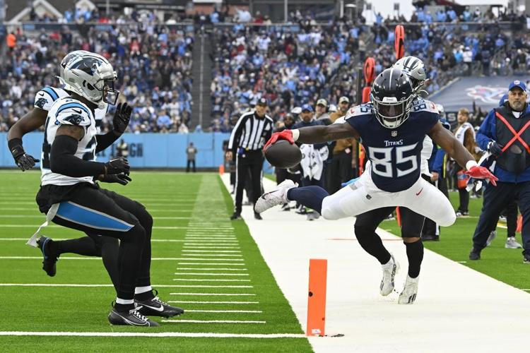 Derrick Henry runs for 2 TDs as the Titans hold off Panthers, Bryce Young 17-10