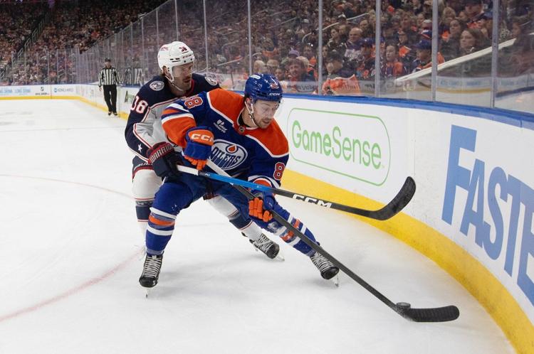Oilers trade Mangiapane, first-round draft pick to Blackhawks for ...