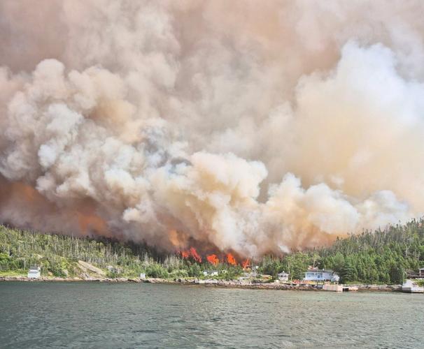 Cabin owners, fire crews racing to save structures from wildfire in ...