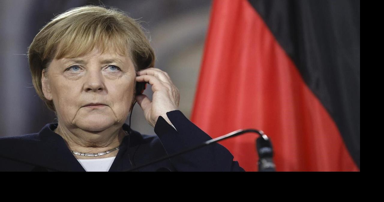 Merkel backs dialogue with Poland over tensions with EU