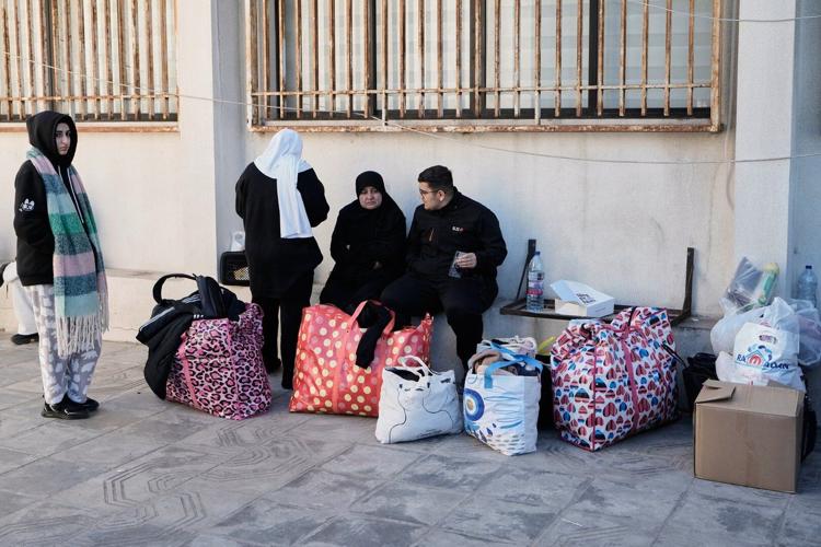 Photos show people fleeing and buildings wrecked after Israeli strikes ...