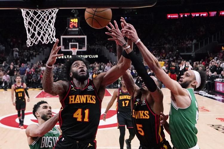 Young scores 32, Hawks beat Celtics 130-122 to close to 2-1