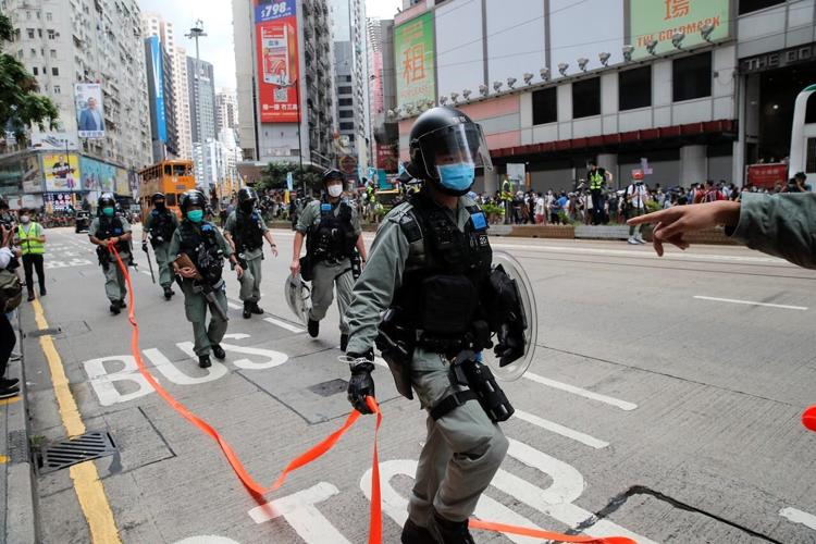 Hong Kong Police Make First Arrests Under New Security Law