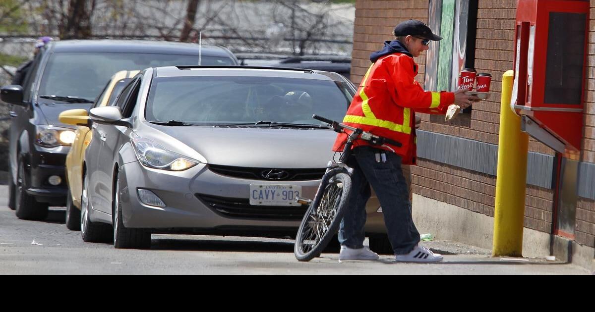 Tim Hortons uniform may soon include masks, as drive-thrus and dining ...
