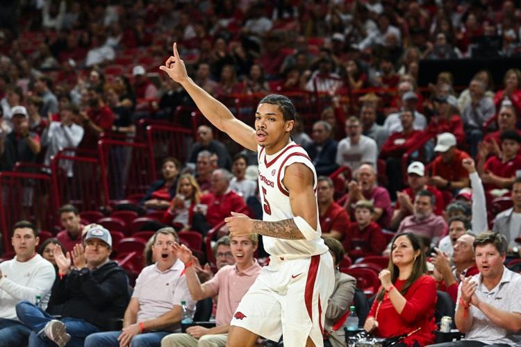 No. 21 Arkansas holds off Samford 79-75 behind freshman guards