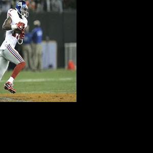 Giants' Burress shoots himself in the leg