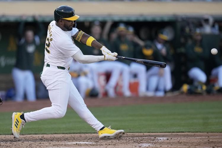 Hogan Harris and 3 Athletics relievers combine to blank Astros 4-0