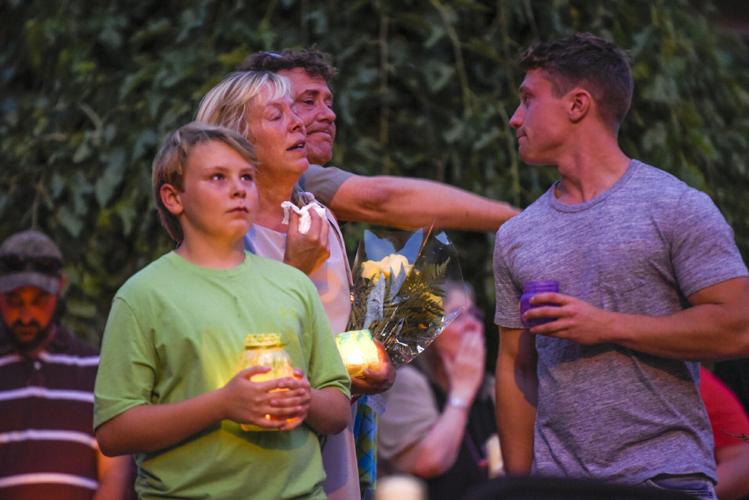 Sombre crowd of hundreds gathers to mourn 11-year-old boy