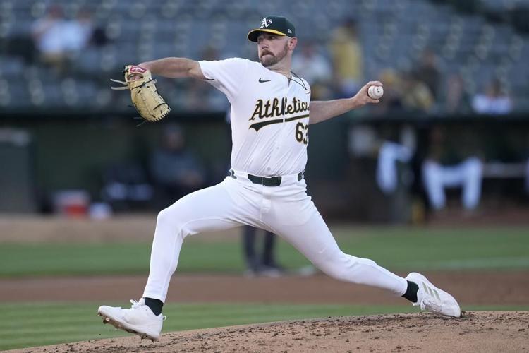 Hogan Harris and 3 Athletics relievers combine to blank Astros 4-0