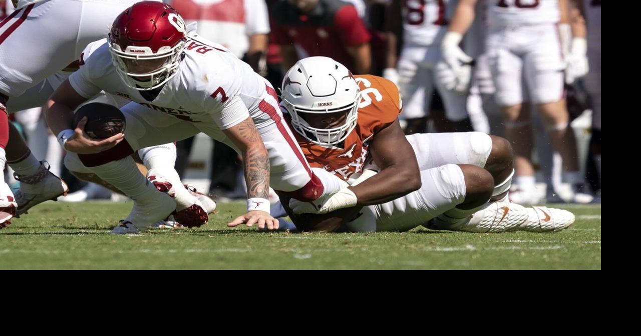Boomer: Brooks 2 late TDs, No. 6 Oklahoma beats Texas 55-48