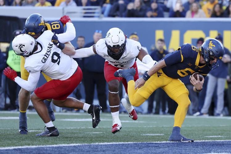Jahiem White and Garrett Greene run wild in West Virginia's 42-21 romp ...