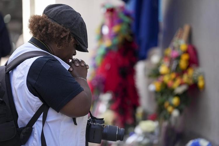 New Orleans mourns truck attack victims with tearful vigil