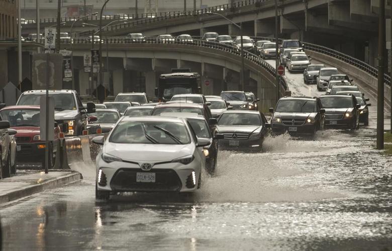Flooded walkways, subway service reopened after another night of ...