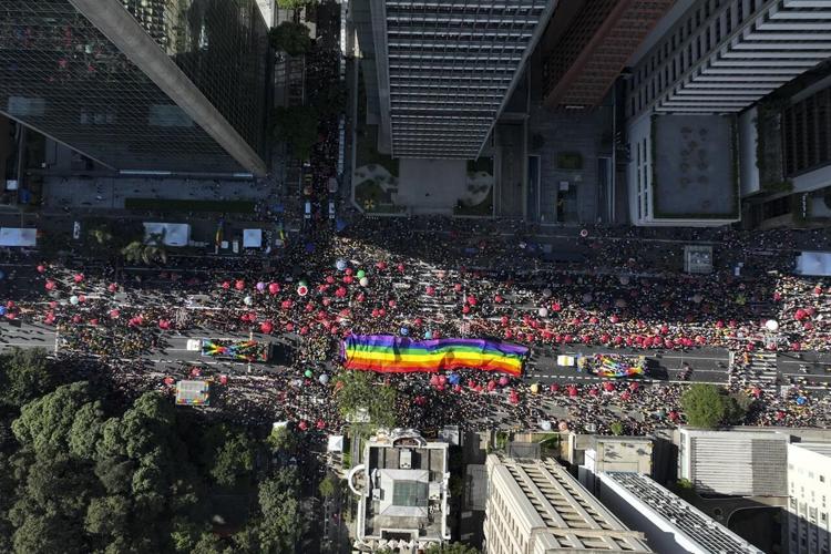 Gay pride revelers in Sao Paulo reclaim Brazil's national symbols