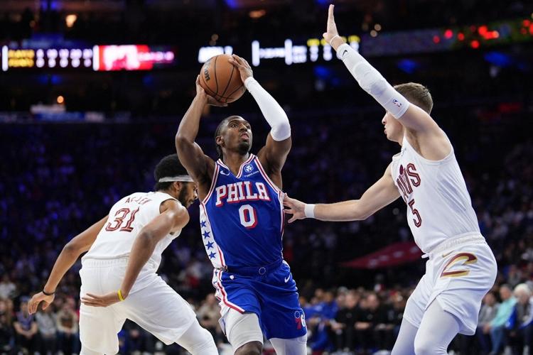 Mitchell has 35 points to power Cavs past 76ers 133-107 but Garland ...