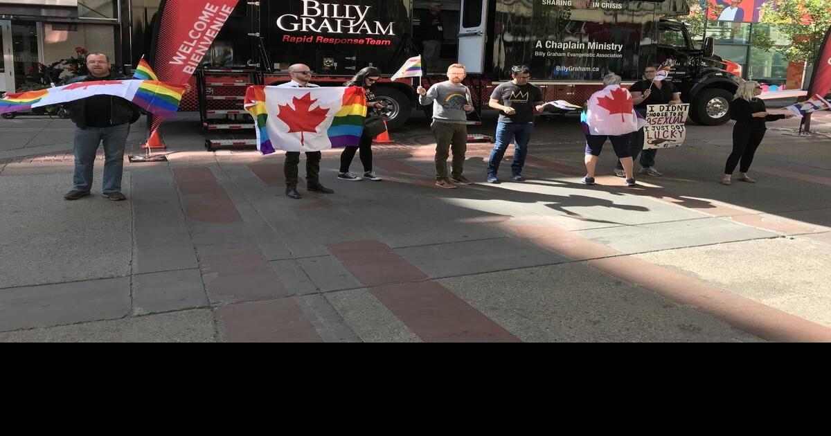 LGBTQ supporters protest Billy Graham Association presence in Calgary ...