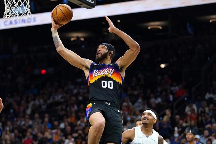 Devin Booker helps NBA-leading Suns past Magic 132-105